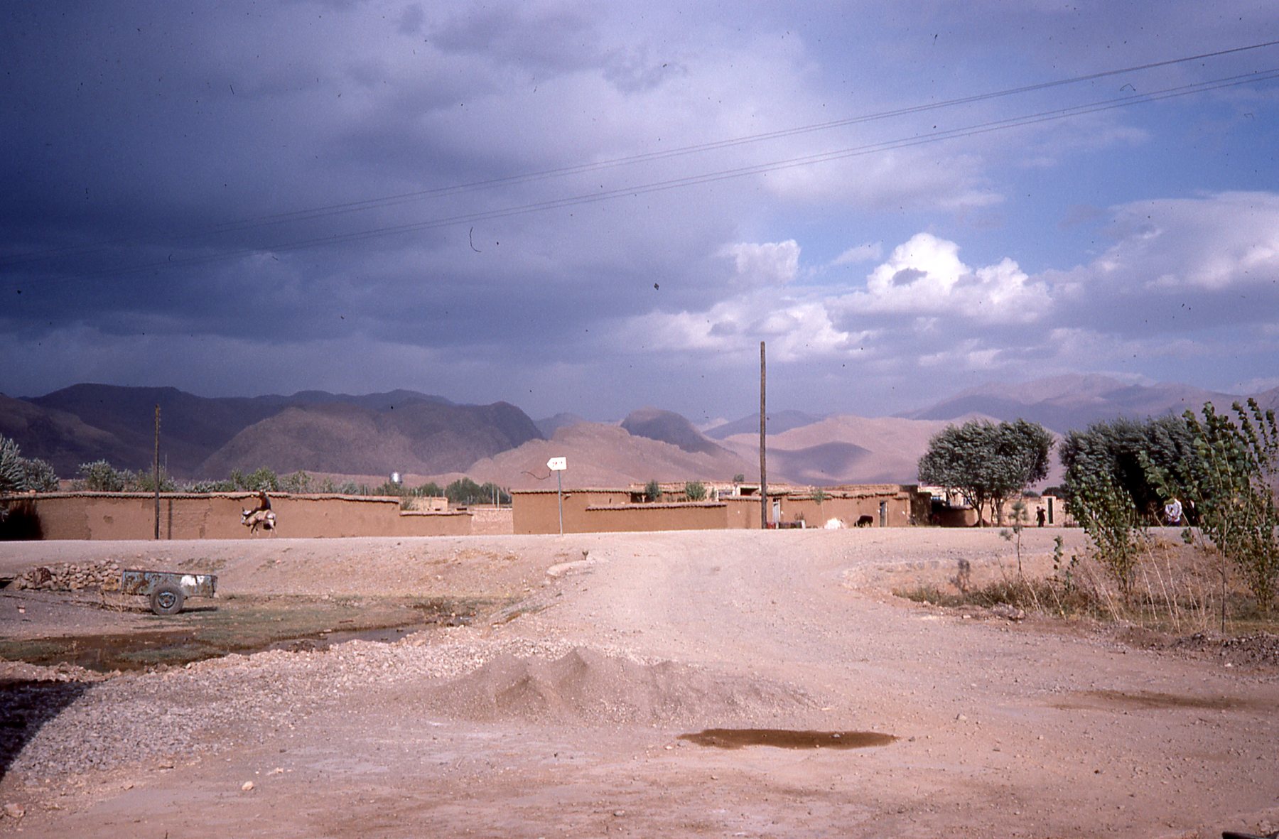 Building exteriors with hills in background | DW Digital Archive